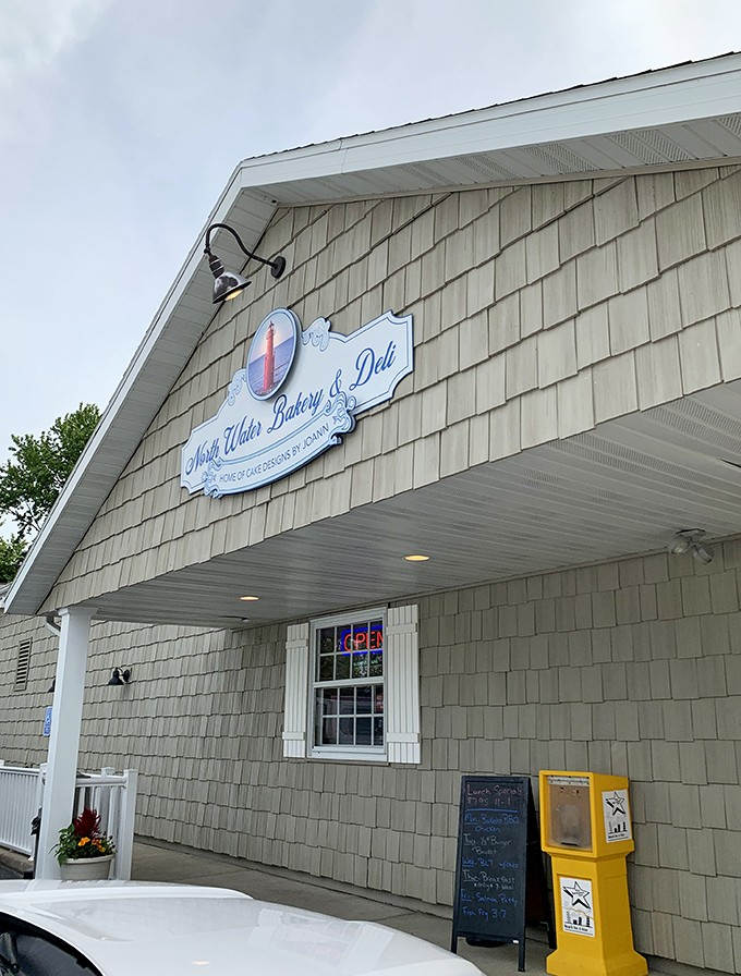 North Water Bakery's charming exterior promises freshly baked treats inside, where locals gather for morning coffee and hometown gossip.