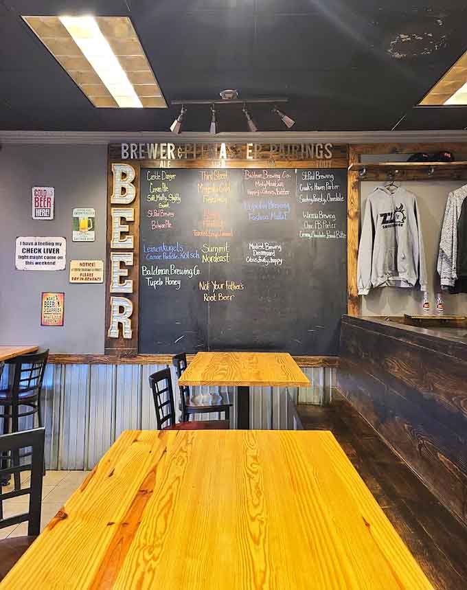 The beer wall spelling it out in lights, because subtlety is overrated when you've got craft brews that pair perfectly with barbecue.
