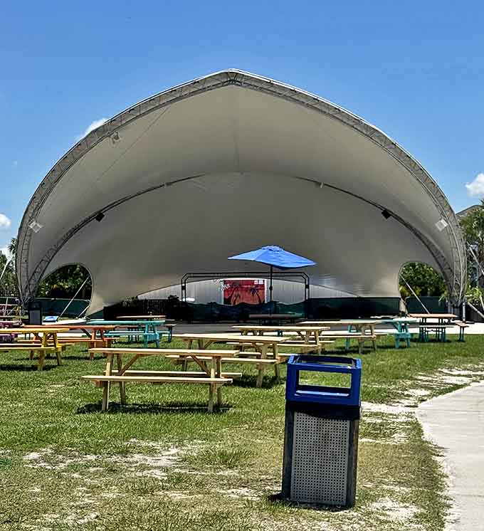 The amphitheater creates the perfect setting for live performances, where melodies float across the water as the day winds down.