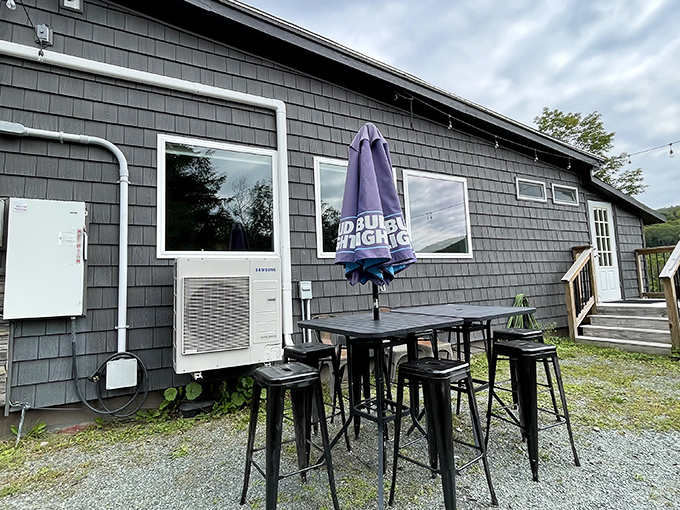 The outdoor seating area offers fresh mountain air with your meal &ndash; complete with branded umbrellas for those occasional Vermont summer showers.
