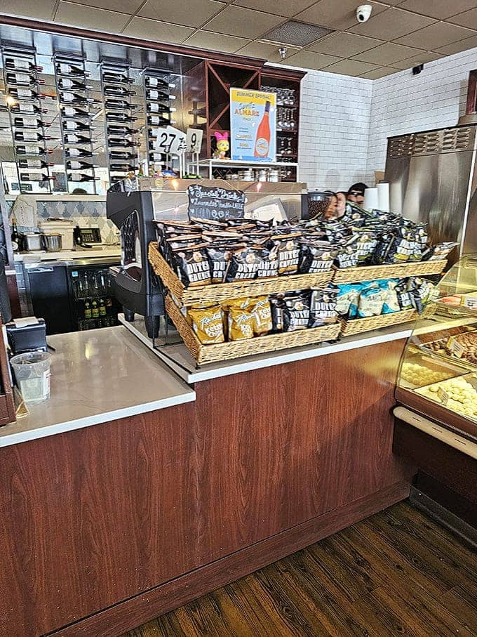 The service counter where dreams come true and willpower goes to die, one pastry at a time, all day long.