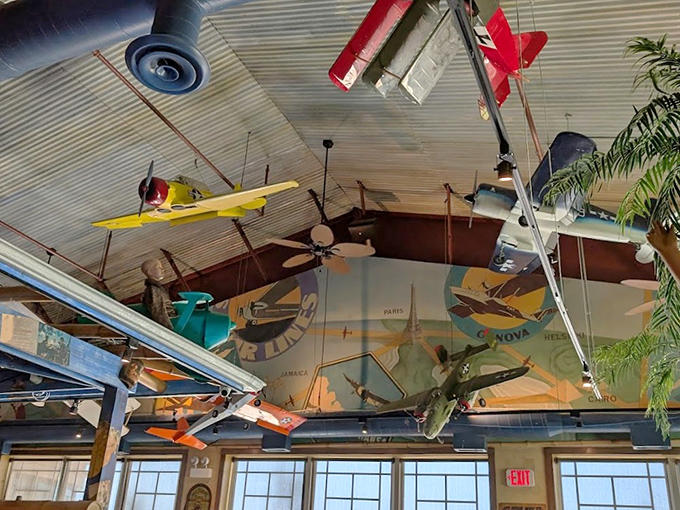The ceiling display turns dining into an aviation museum experience, minus the "do not touch" signs and boring audio guides.