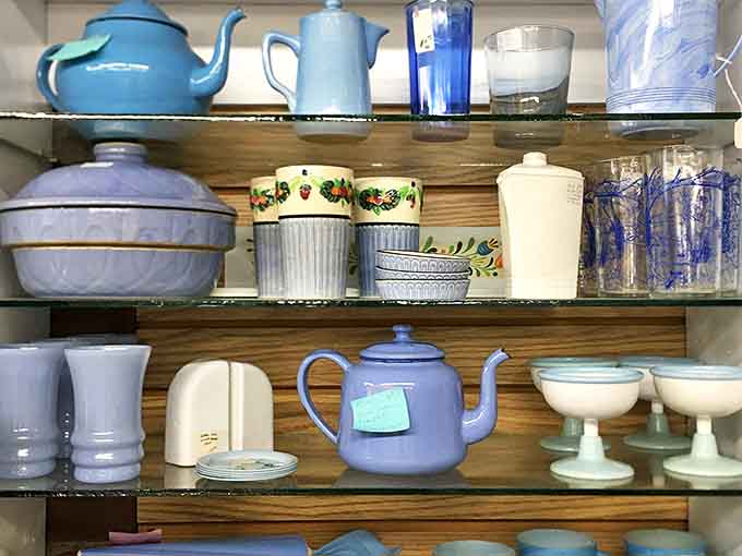 Delicate teapots and serving pieces in soft pastels await their next gathering, ready to elevate ordinary moments to special occasions.