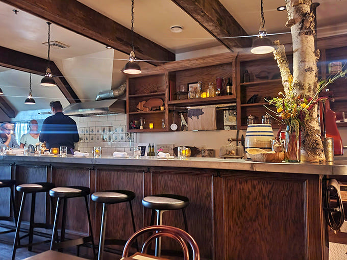 The service counter where culinary dreams are assembled before heading to your eager table.