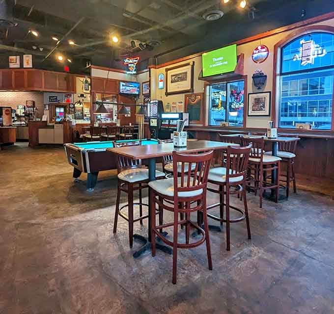 The dining area where pool tables and good times coexist peacefully, creating that perfect pub atmosphere everyone's looking for.