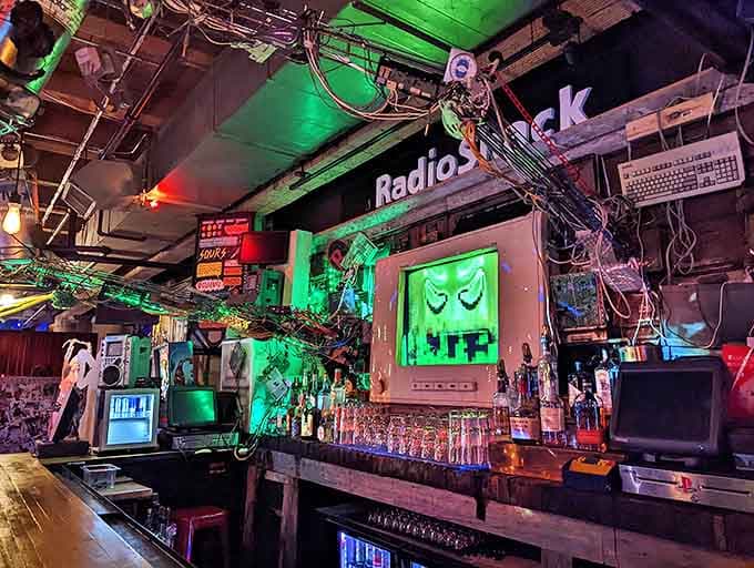 The cyberpunk-inspired bar area features old computer monitors repurposed with eerie green displays &ndash; where Max Headroom would feel right at home ordering a cocktail.