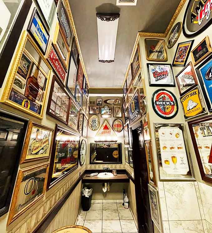 Even the restroom is an experience at Jake's, with walls covered in vintage beer memorabilia that gives new meaning to "bathroom reading material."