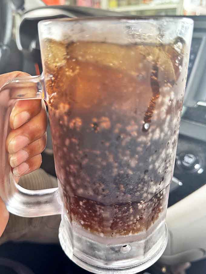 A frosty mug of liquid nostalgia &ndash; creamy, spicy root beer with the perfect foam cap that brings back childhood memories with every sip.