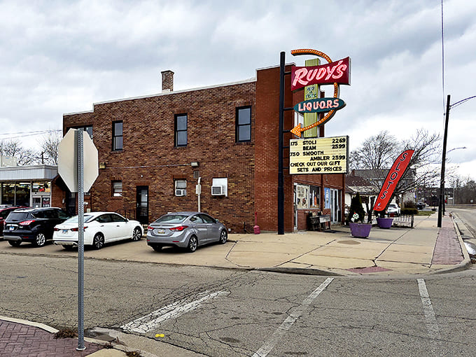 Rudy's Liquor Store has been serving the neighborhood for decades, functioning as both business and community hub where locals gather and connect.