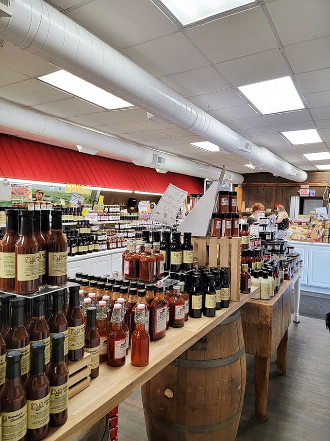 Bottles of specialty sauces stand at attention like delicious soldiers, their contents promising to revolutionize everything from barbecue to salad dressing.