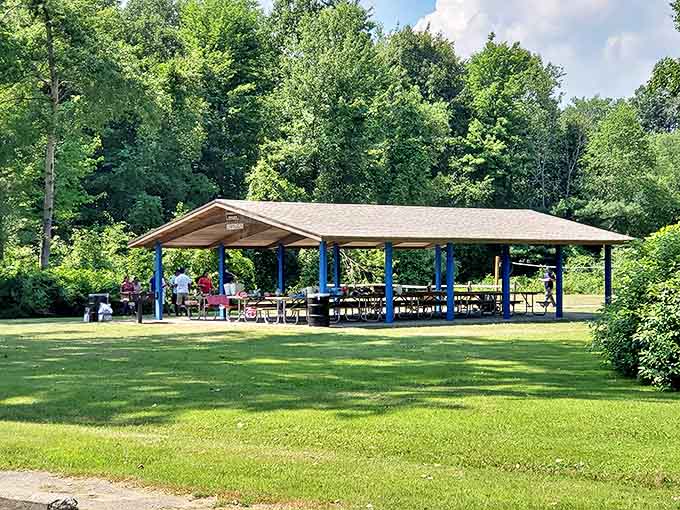 This spacious shelter stands ready for family reunions and impromptu picnics, where shared meals taste better with a side of lake views.
