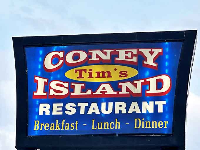 The iconic signage glows like a beacon for hungry travelers, promising three square meals and Greek delights.