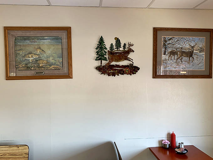 Wildlife prints and hunting memorabilia on simple walls speak to North Woods traditions without a hint of urban irony.