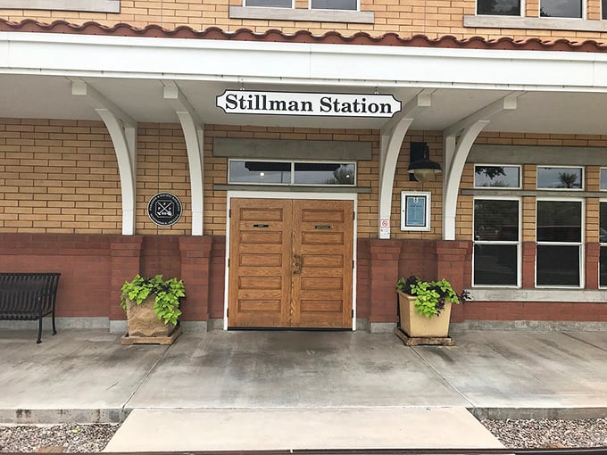 Stillman Station's classic brick facade and wooden doors welcome visitors with architectural details reminiscent of America's great railway depots.