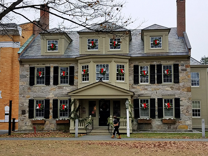 Stone Building: Christmas card perfection! These holiday wreaths transform historic stonework into a festive masterpiece that would make even Scrooge feel merry.