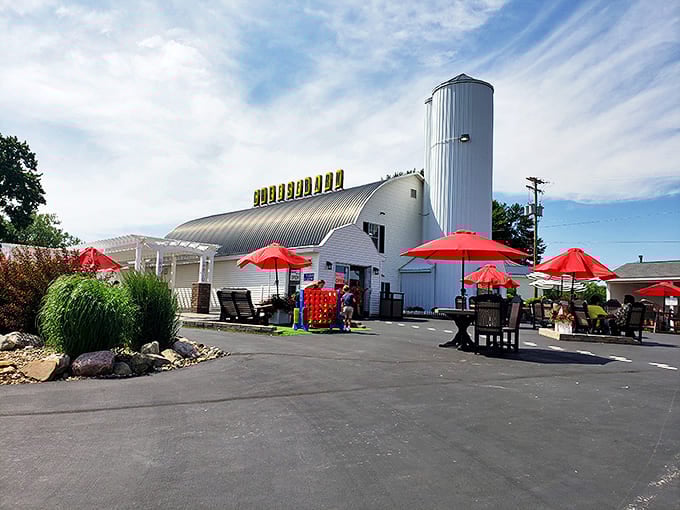 The iconic barn structure stands proudly against the Ohio sky, its silo and bright yellow sign beckoning cheese pilgrims from miles away.