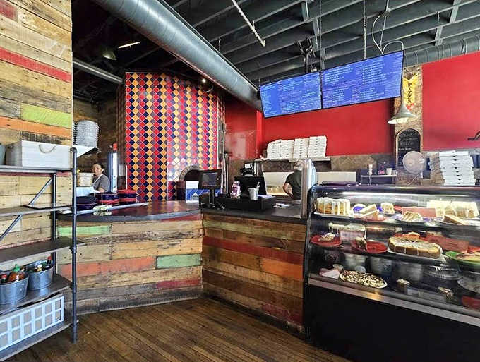 The service counter showcases the colorful, vibrant design elements and displays of fresh ingredients that hint at the quality coming from the kitchen.