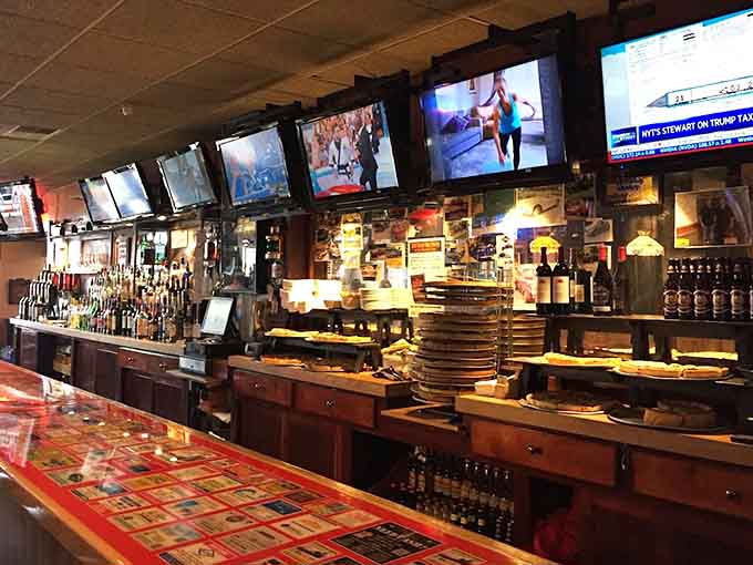 The well-stocked bar and multiple screens create the perfect backdrop for game day gatherings and casual conversations.