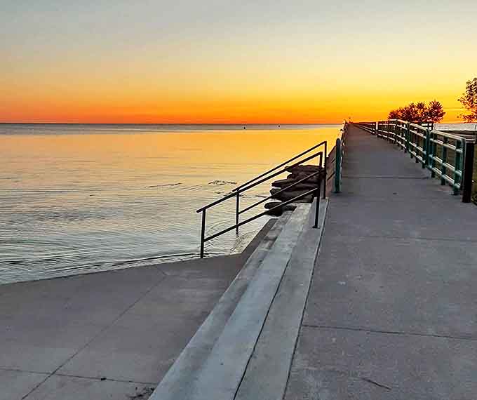 Sunset transforms Caseville's boardwalk into a silhouette against nature's nightly masterpiece of orange, pink and purple.