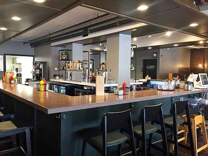 The sleek bar area invites you to pull up a stool and stay awhile, with plenty of taps and a welcoming atmosphere.