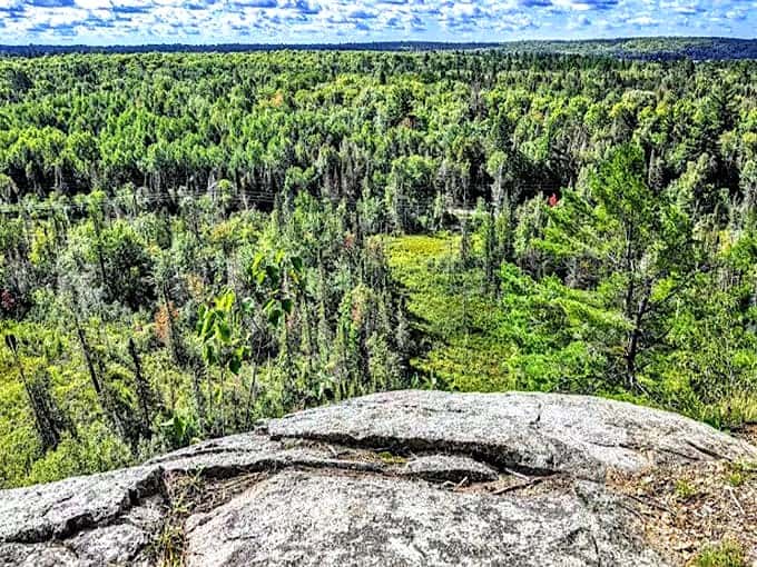 The playground offers a perfect base camp for kids, though the real adventures happen in the surrounding woods and waters.