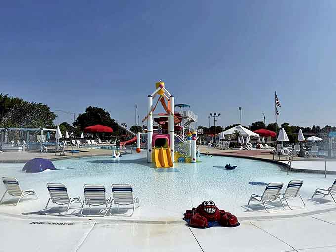 The park's mascot, a cheerful red crab, stands guard by the zero-entry pool, welcoming water enthusiasts of all swimming abilities.