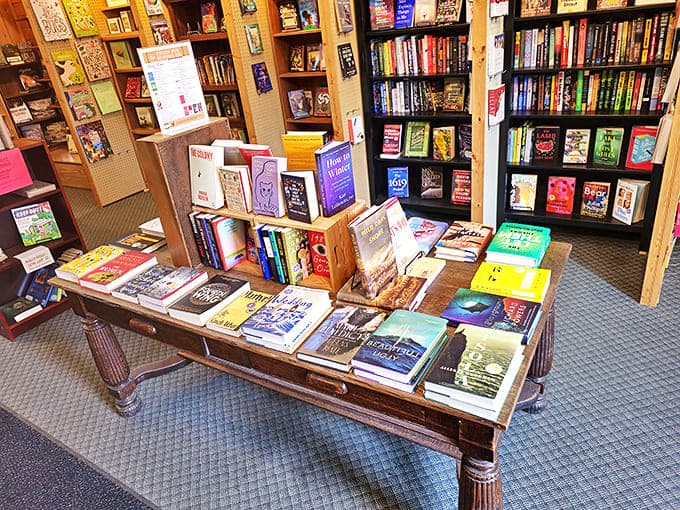 The central display table offers a feast for the eyes and mind, with titles arranged to entice even the most reluctant reader.