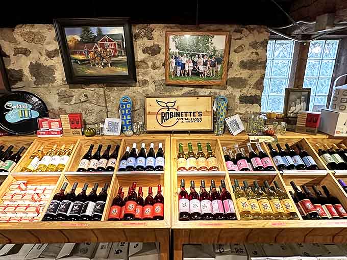 The wine display showcases bottles like colorful soldiers standing at attention, each one promising a different fruit-forward adventure for your taste buds.