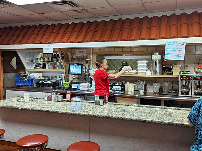 Where the magic happens &ndash; the bustling counter area where orders are called, coffee flows freely, and diner dreams come true.