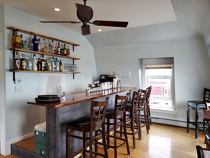 The bar area &ndash; where locals share fishing tales while mixologists craft cocktails worthy of accompanying the ocean's finest offerings.