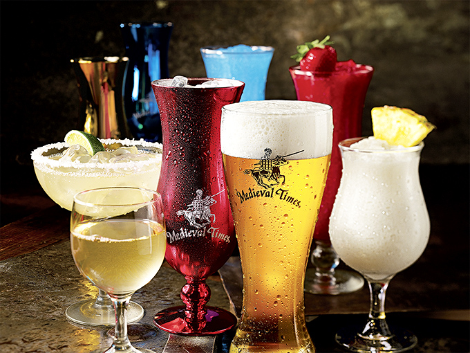 The bar's colorful signature drinks come in souvenir glasses &ndash; because nothing says "medieval authenticity" like a frozen daiquiri in a collectible cup.