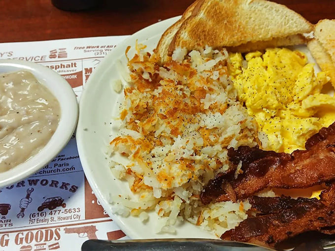 The breakfast plate that launched a thousand productive mornings &ndash; eggs, hash browns, bacon, and toast in perfect harmony.