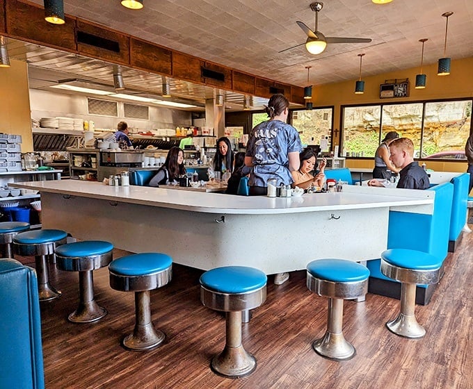 Counter seating where burger dreams come true – watch the magic happen from your front-row swivel stool.