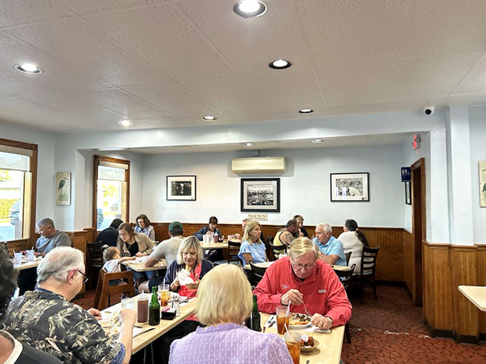 Where memories are made between bites &ndash; happy patrons sharing stories and seafood in O'Steen's comfortable, unpretentious dining room.