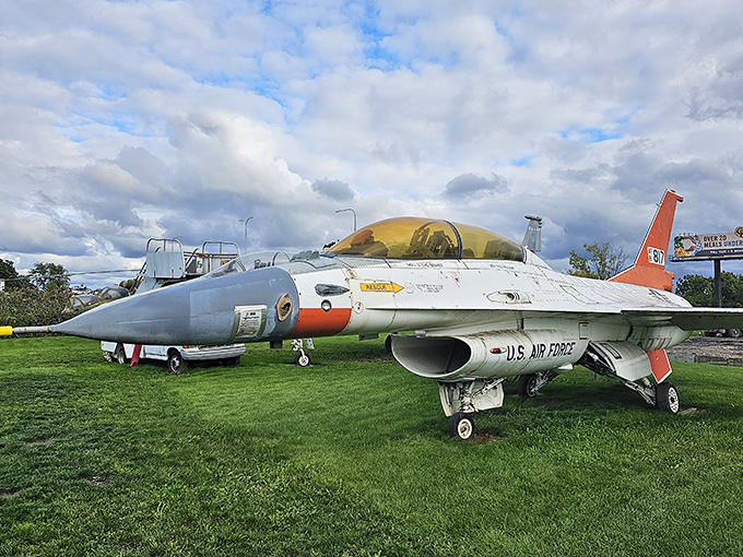 This sleek U.S. Air Force jet trainer rests on the museum grounds, its distinctive orange tail fin standing proudly against the Illinois sky.