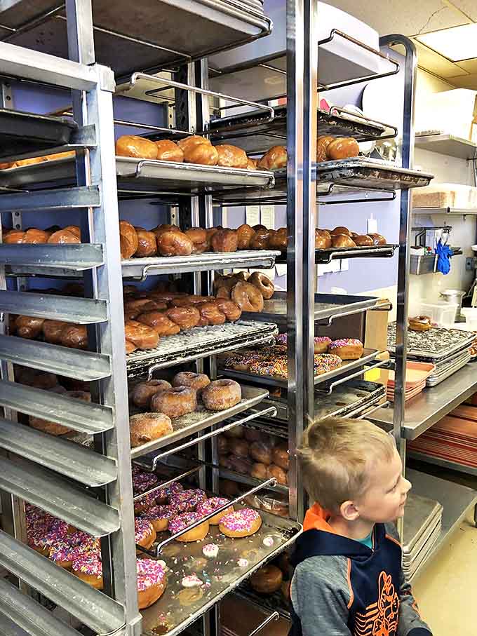Freshly Baked Donuts: Racks of golden rings waiting patiently for their moment of glory &ndash; like Olympic athletes of the pastry world.