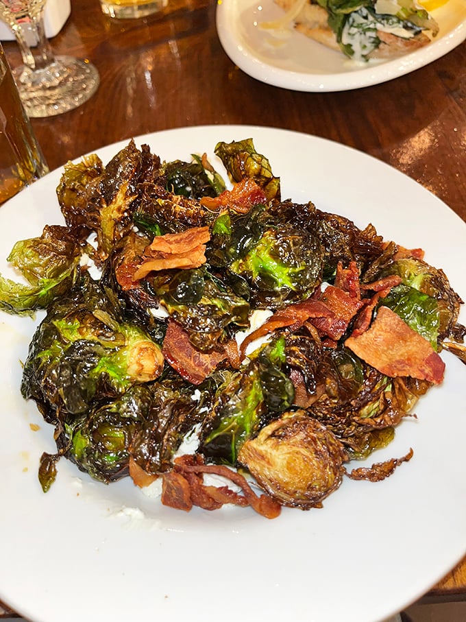 Brussels sprouts shed their childhood reputation in this crispy, bacon-enhanced version that disappears from plates with suspicious speed. Vegetable redemption at its finest.