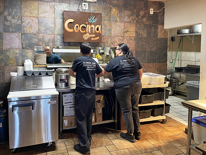 Where the magic happens &ndash; El Pinche Juan's kitchen crew crafting those legendary dishes with practiced hands and time-honored techniques.