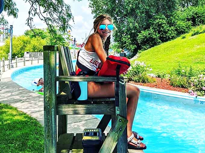 Lifeguards perch like vigilant sentinels, ensuring safety while secretly envying those floating without a care in the refreshing lazy river.