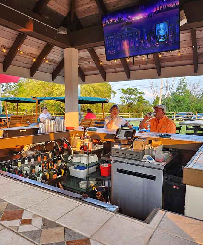 The outdoor bar brings the party outside, complete with TVs and that unbeatable lake breeze atmosphere.