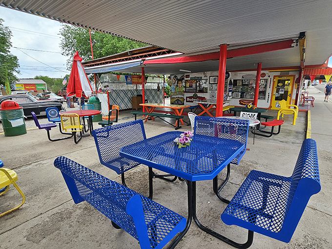 Colorful outdoor seating invites road-weary travelers to rest awhile, share stories, and make connections under the Arizona sky.