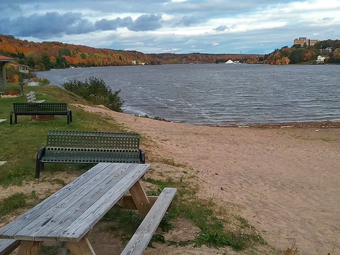 Simple pleasures await at lakeside parks where picnic tables and benches offer front-row seats to nature's ever-changing waterfront show.