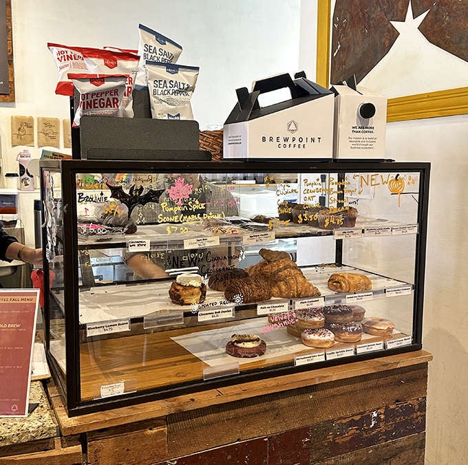 The pastry display case is basically a museum of deliciousness where every item deserves its own spotlight and standing ovation.