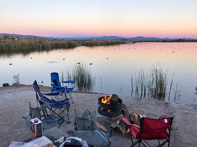 When "office view" gets a serious upgrade&mdash;camp chairs, crackling fire, and a lake view that makes your home TV screen seem tragically inadequate.