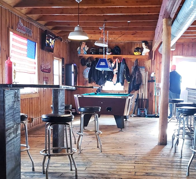 A pool table in a burger joint is the universal sign that this is a place where you're encouraged to stay awhile and enjoy yourself.