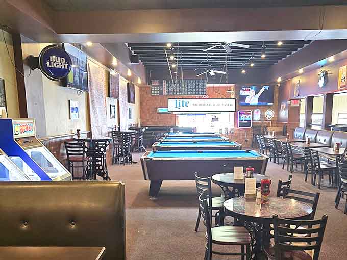 Pool tables offer entertainment between wing baskets. Nothing complements friendly competition like finger-licking good food.