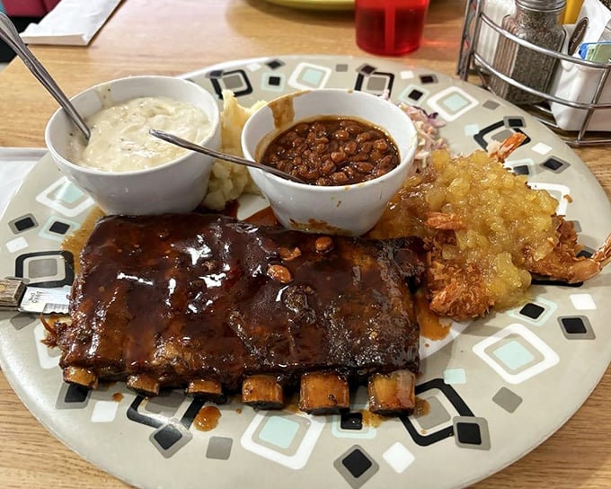 Fall-off-the-bone ribs glazed with sweet-smoky sauce &ndash; proof that napkins should be considered essential road trip equipment.