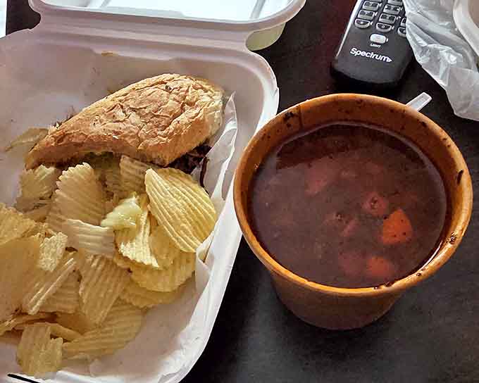 The perfect lunch combo: a hearty sandwich with homemade bread alongside soup that wasn't born in a can, comfort food defined.