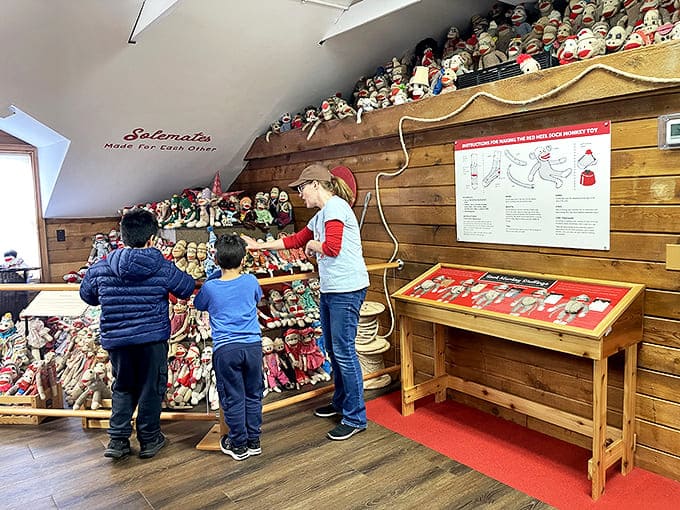 Museum staff share their knowledge and enthusiasm with visitors, passing along the rich tradition of sock monkey craftsmanship.