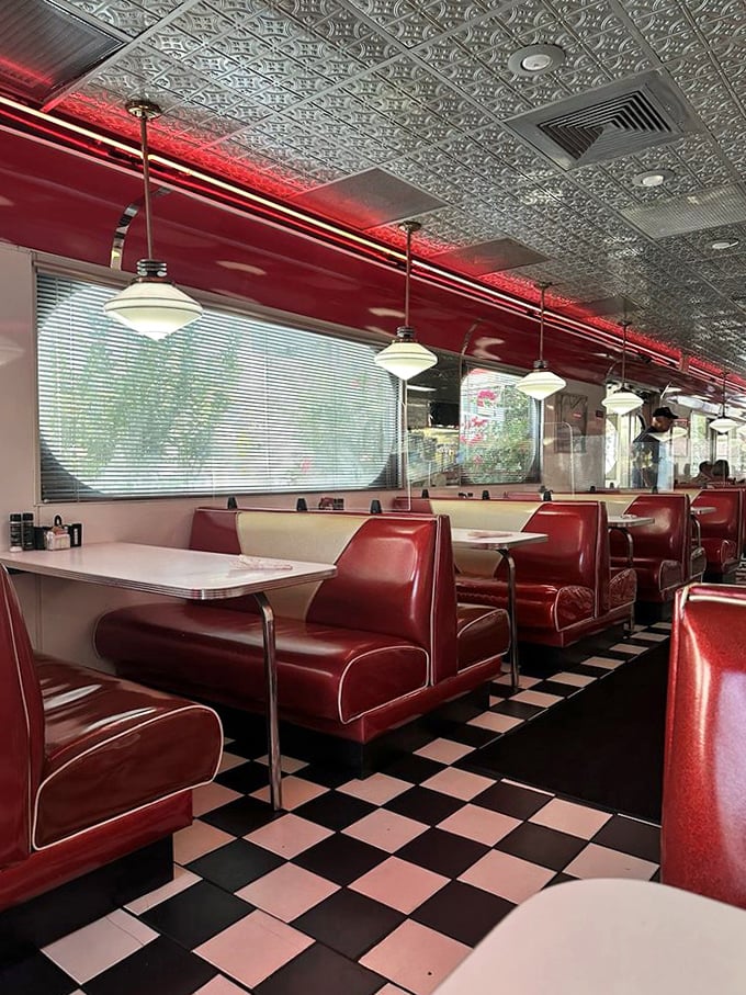 Cherry-red booths invite you to slide in, get comfortable, and stay awhile &ndash; calories don't count when you're sitting in vinyl.